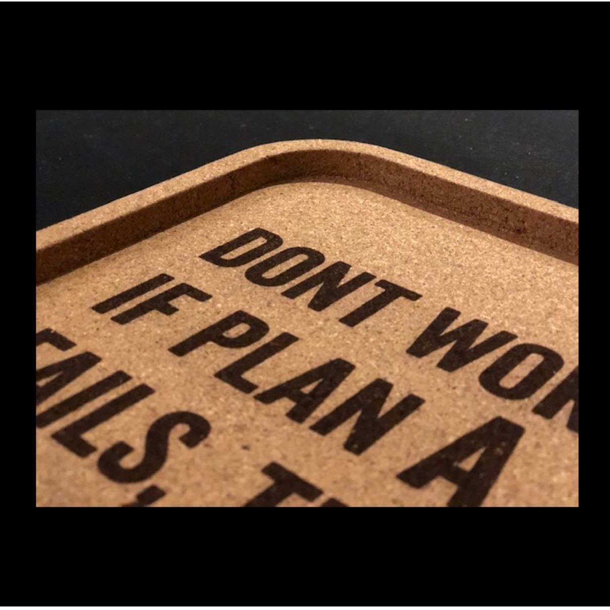 A premium cork keepsake tray